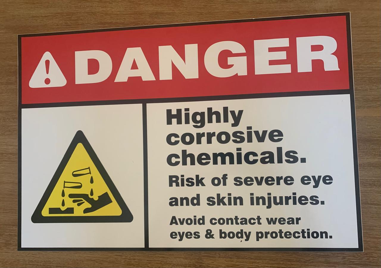 Danger Highly corrosive chemicals safety sign DAN055